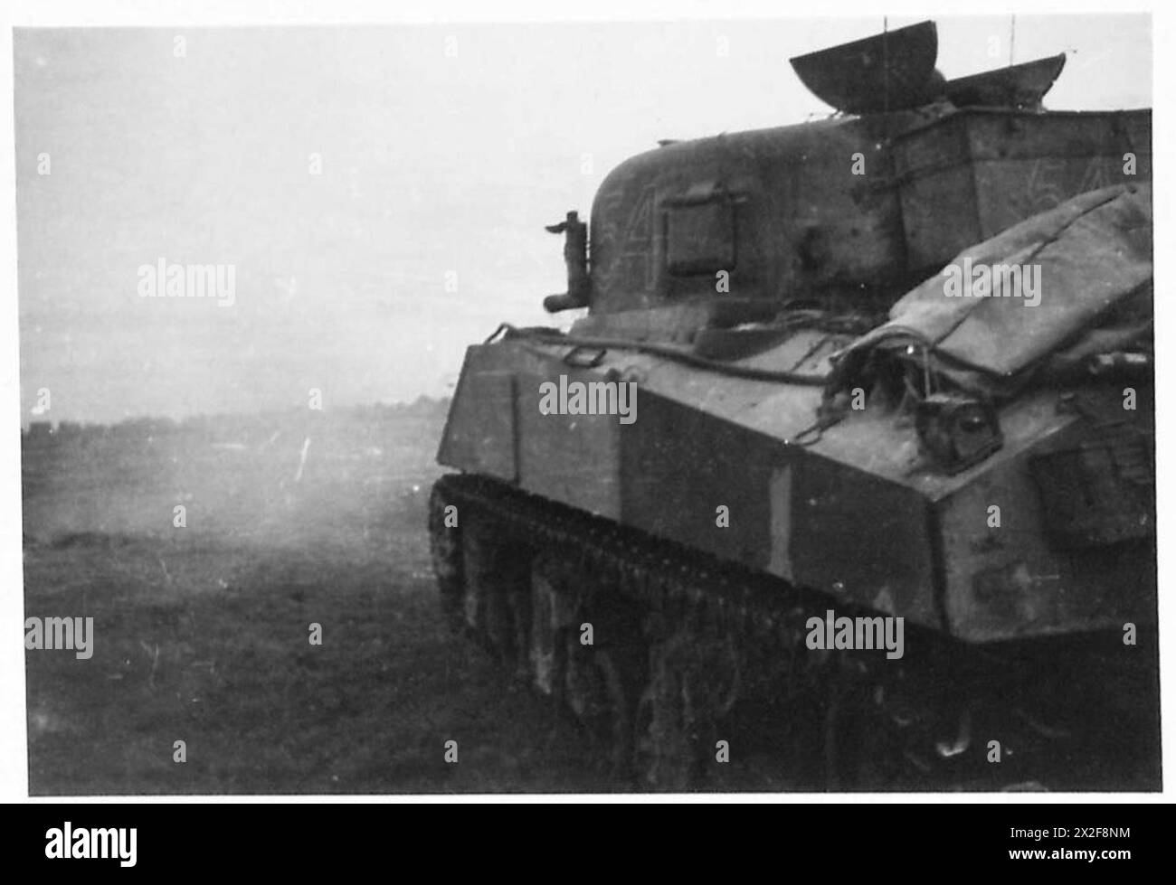 BRITISH TROOPS FIRST BATTLE IN GERMANY - Tank going forward to support ...