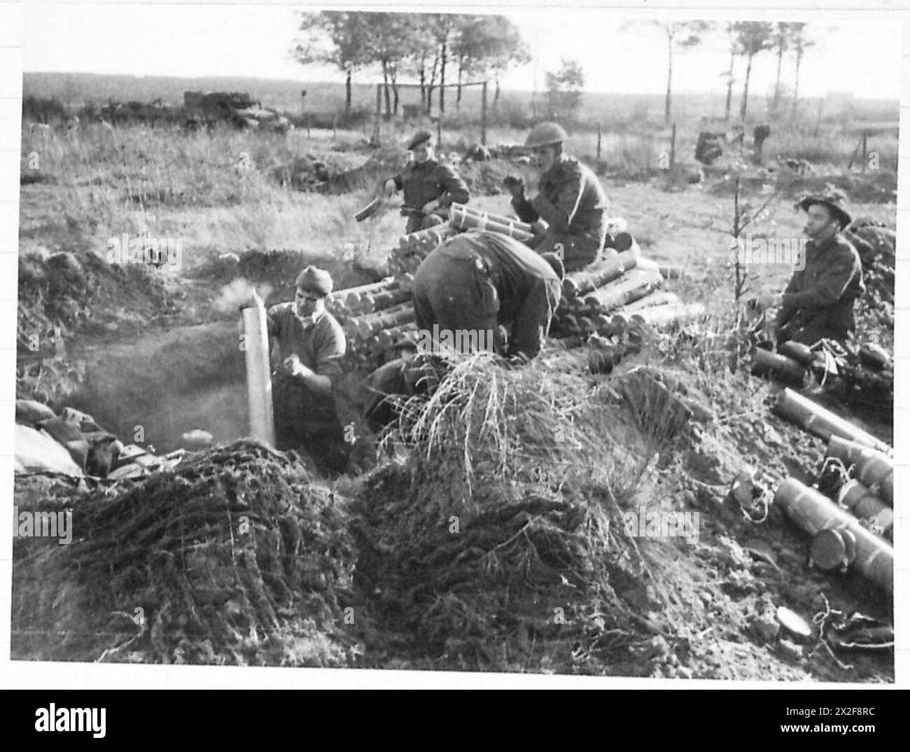 SCENES IN AND AROUND GEILENKIRCHEN - A 3" mortar barrage opens up ...