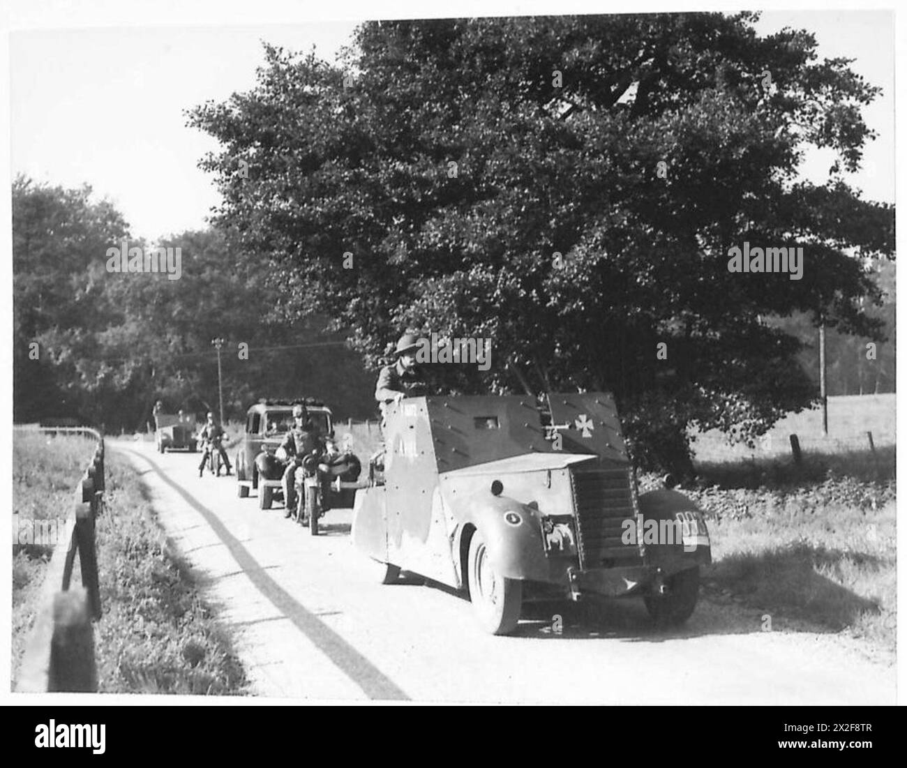 BUMPER EXERCISE (WITH THE ENEMY) - An armoured car preceeded the Nazi ...