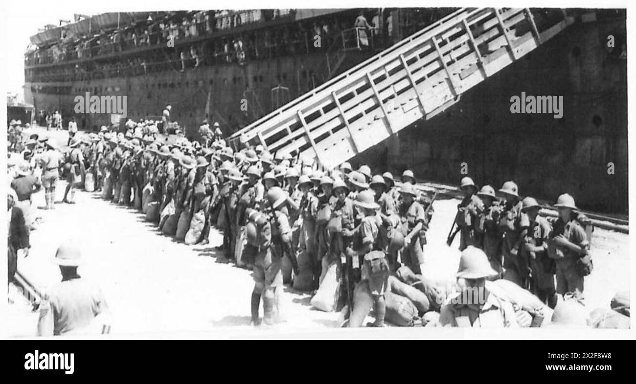 British Army troops line up on the quayside after disembarking as ...