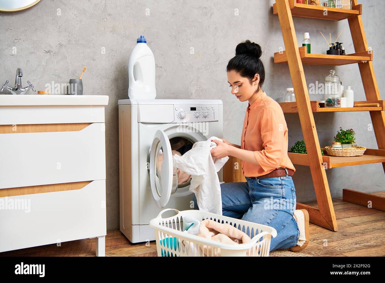 A stylish woman in casual attire sitting beside a washing machine ...