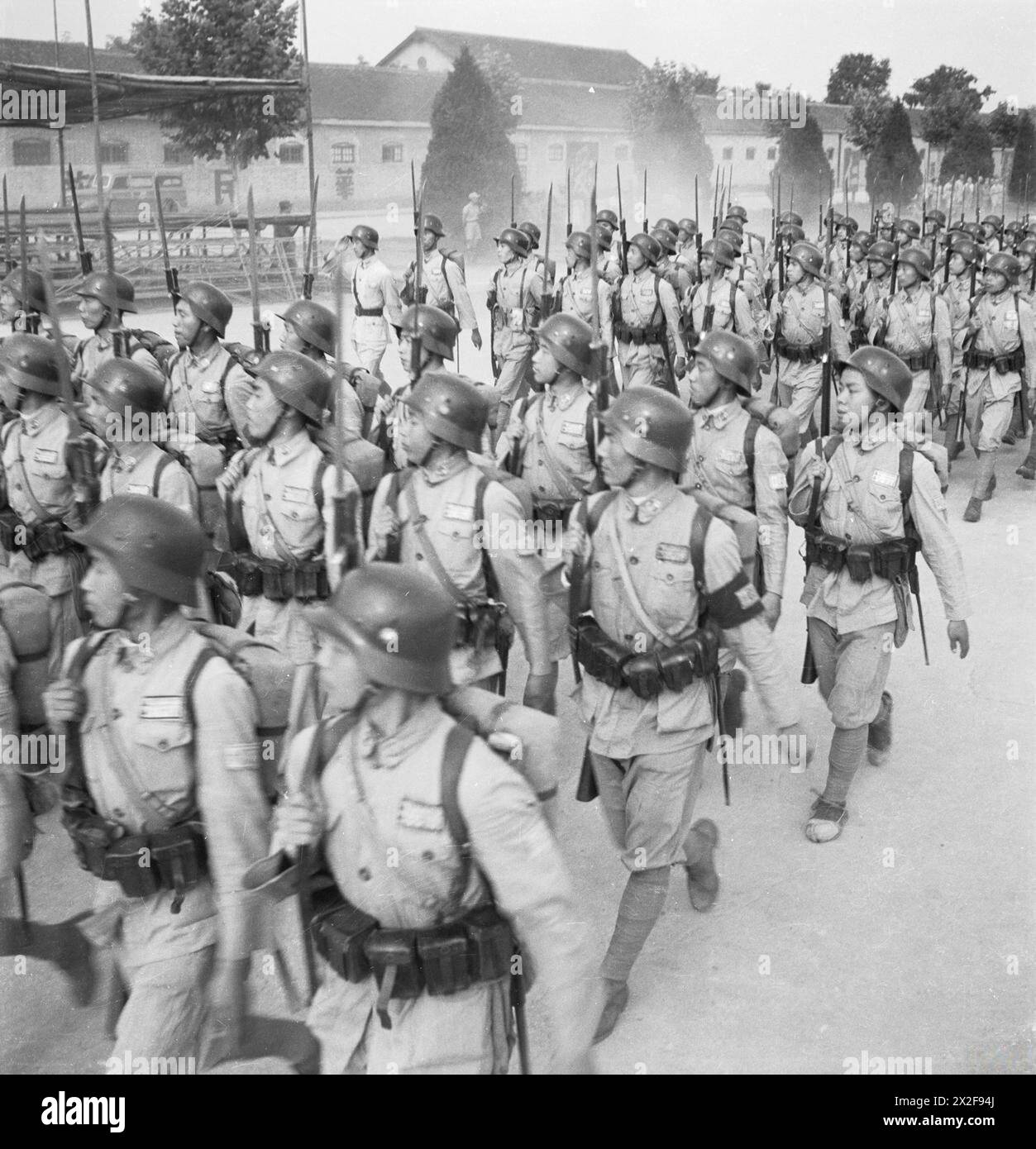 Chinese troops practice a march past at the Chinese Military Academy in ...