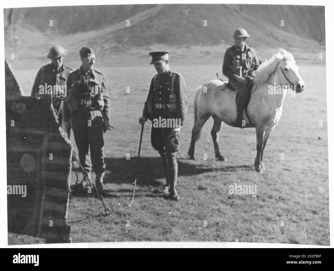 British and Canadian troops stationed in Iceland are shown with ...