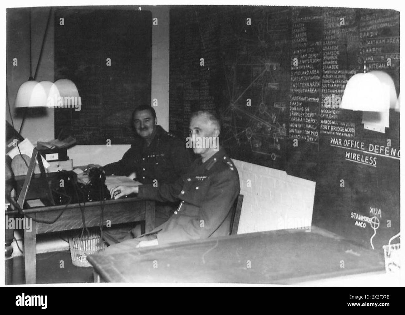 CONTROL ROOM - Colonel Harris, M.C., in his office in the sub-basement ...
