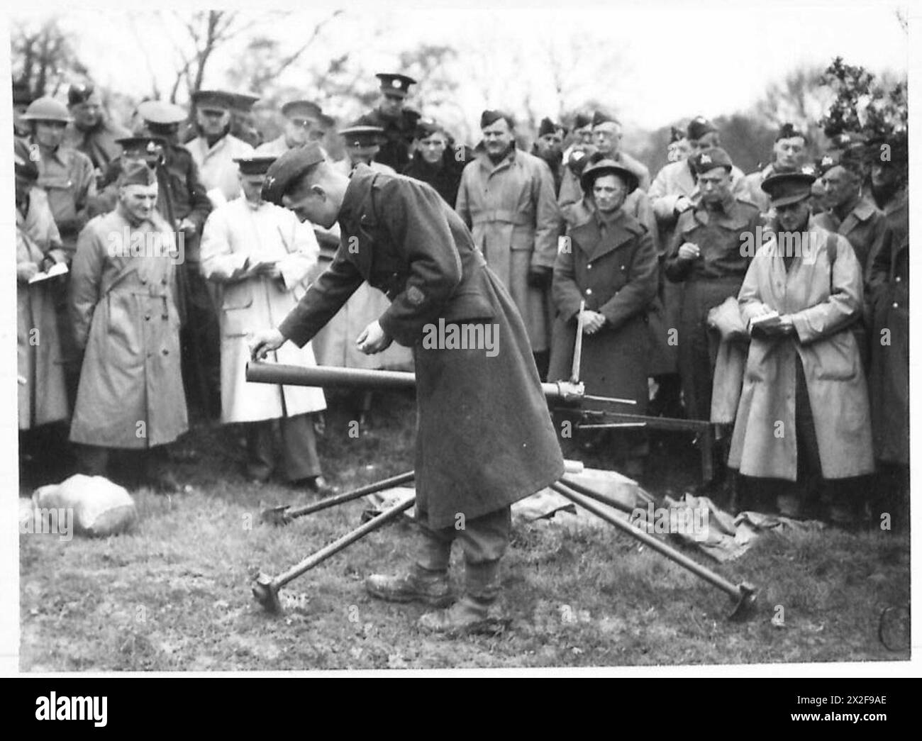 A British Army demonstration of a grenade projector, showing operation ...