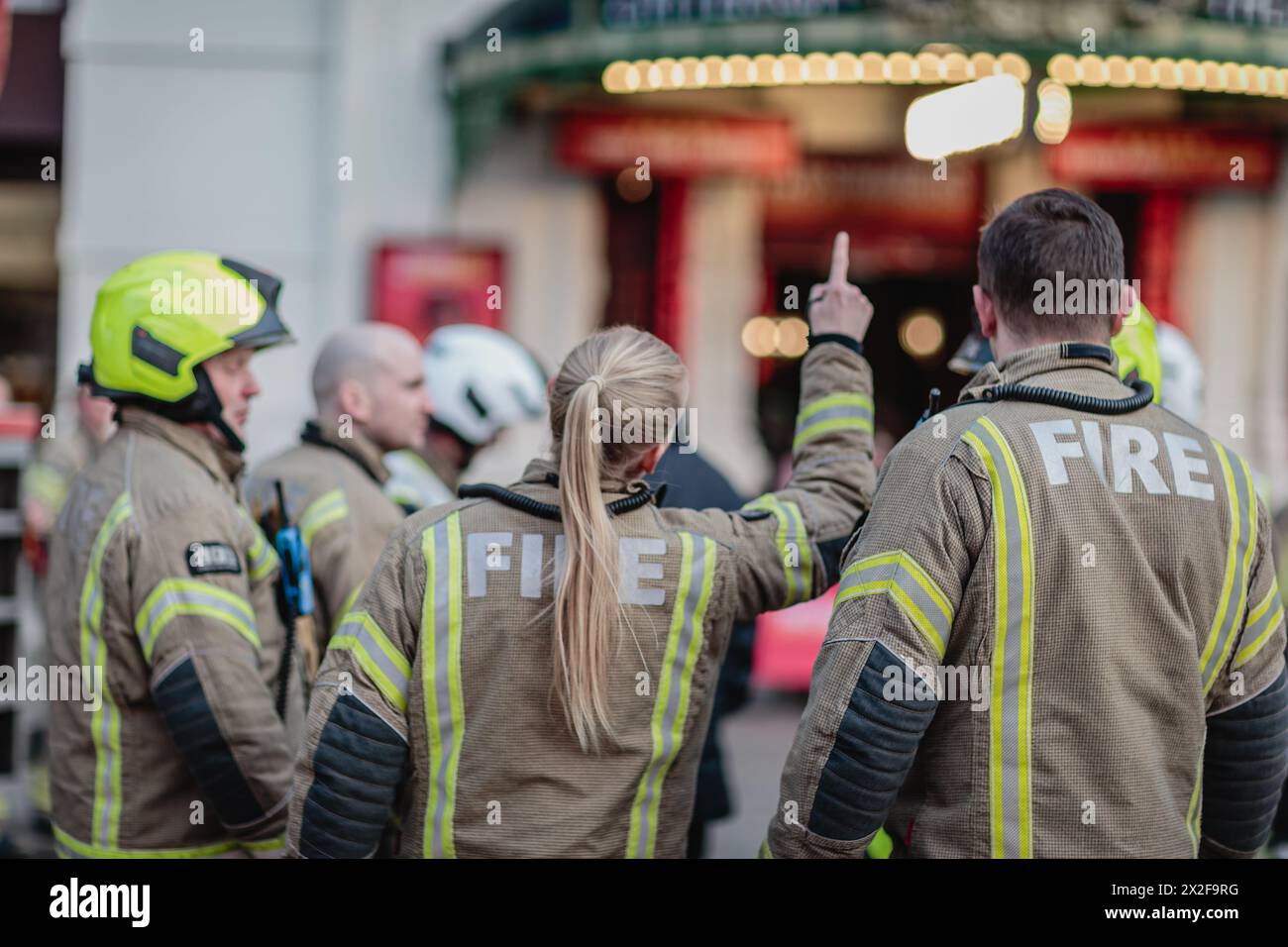 Fire-fighter gather outside a theatre in central London Stock Photo - Alamy