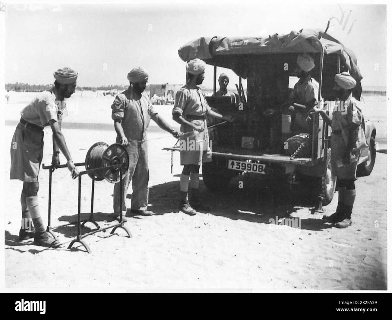 MOBILE SIGNAL STATION - The crew of a Signal lorry preparing to set up ...