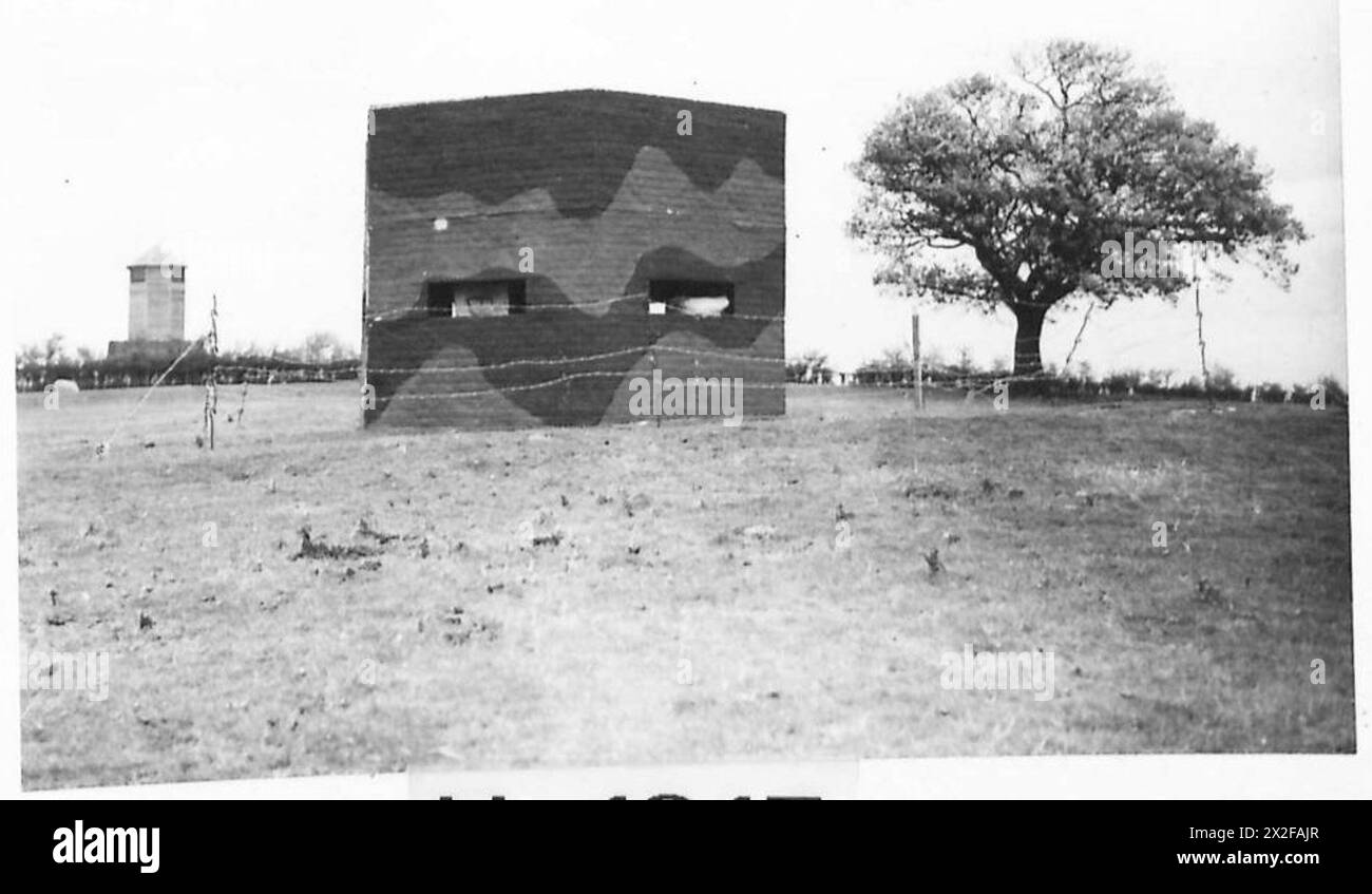 The British Army deploys dummy pillboxes as part of camouflage measures ...