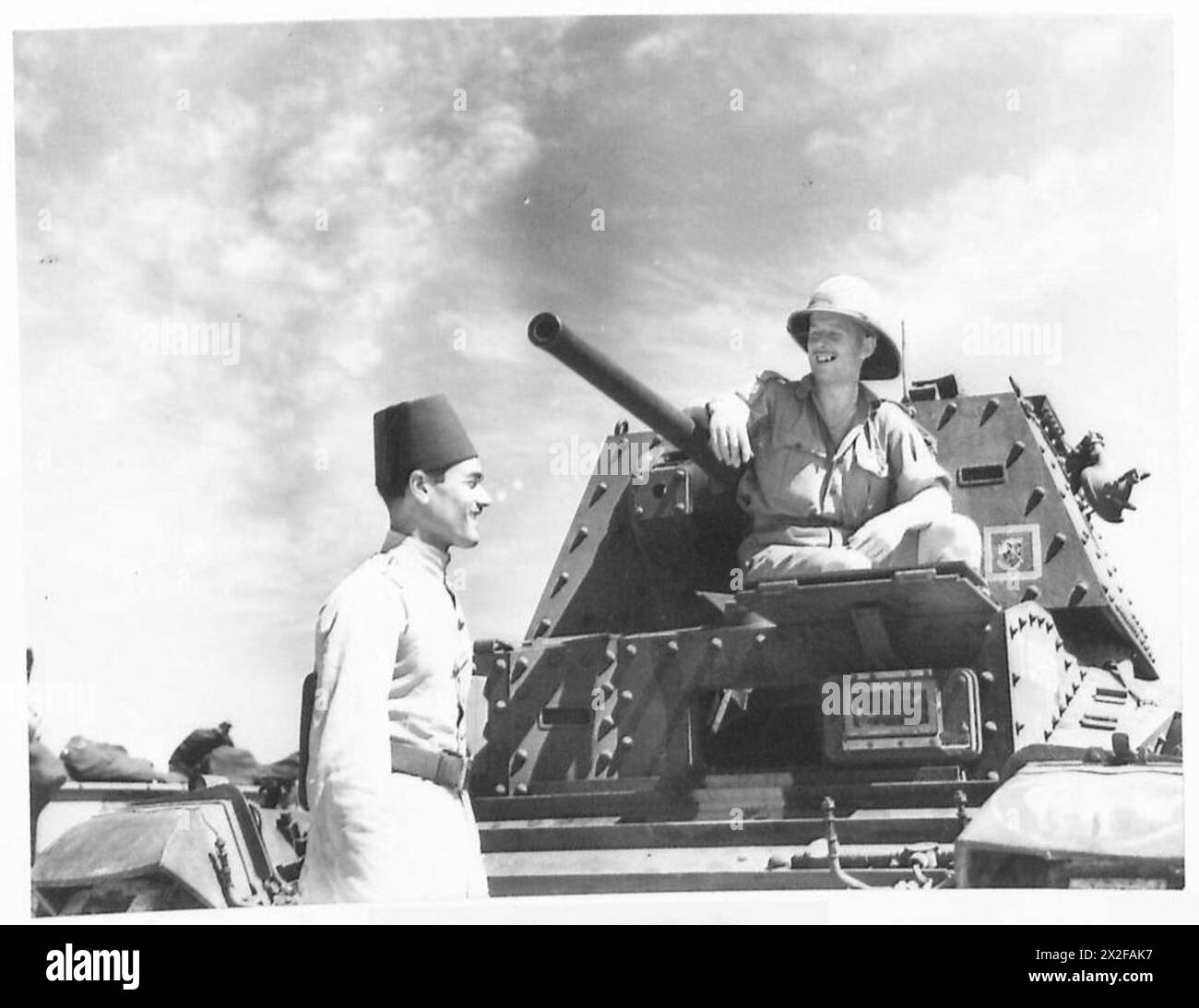 At a dock in Egypt, a British Army policeman interacts with newly ...