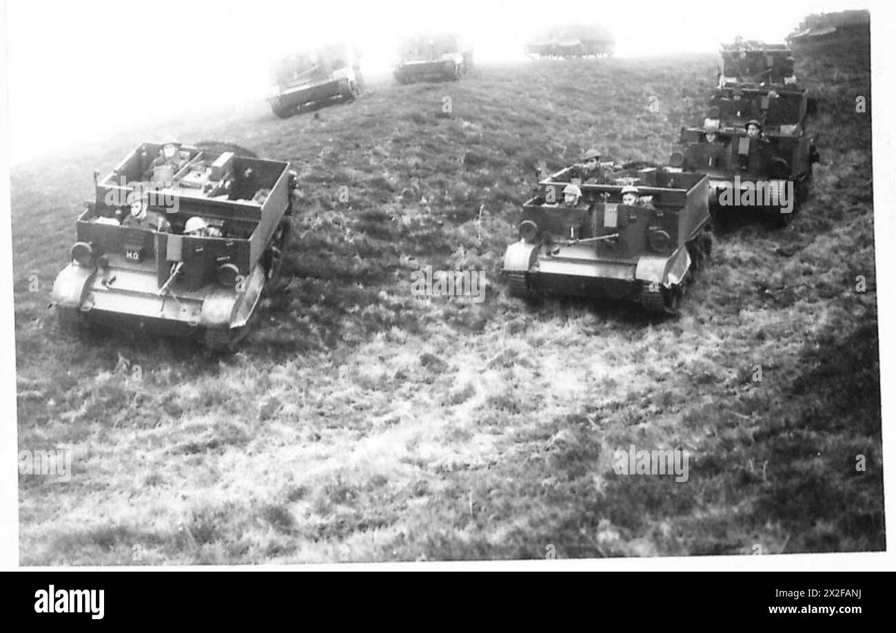 EAST YORKS IN TRAINING - Bren carriers going into action over rough ...
