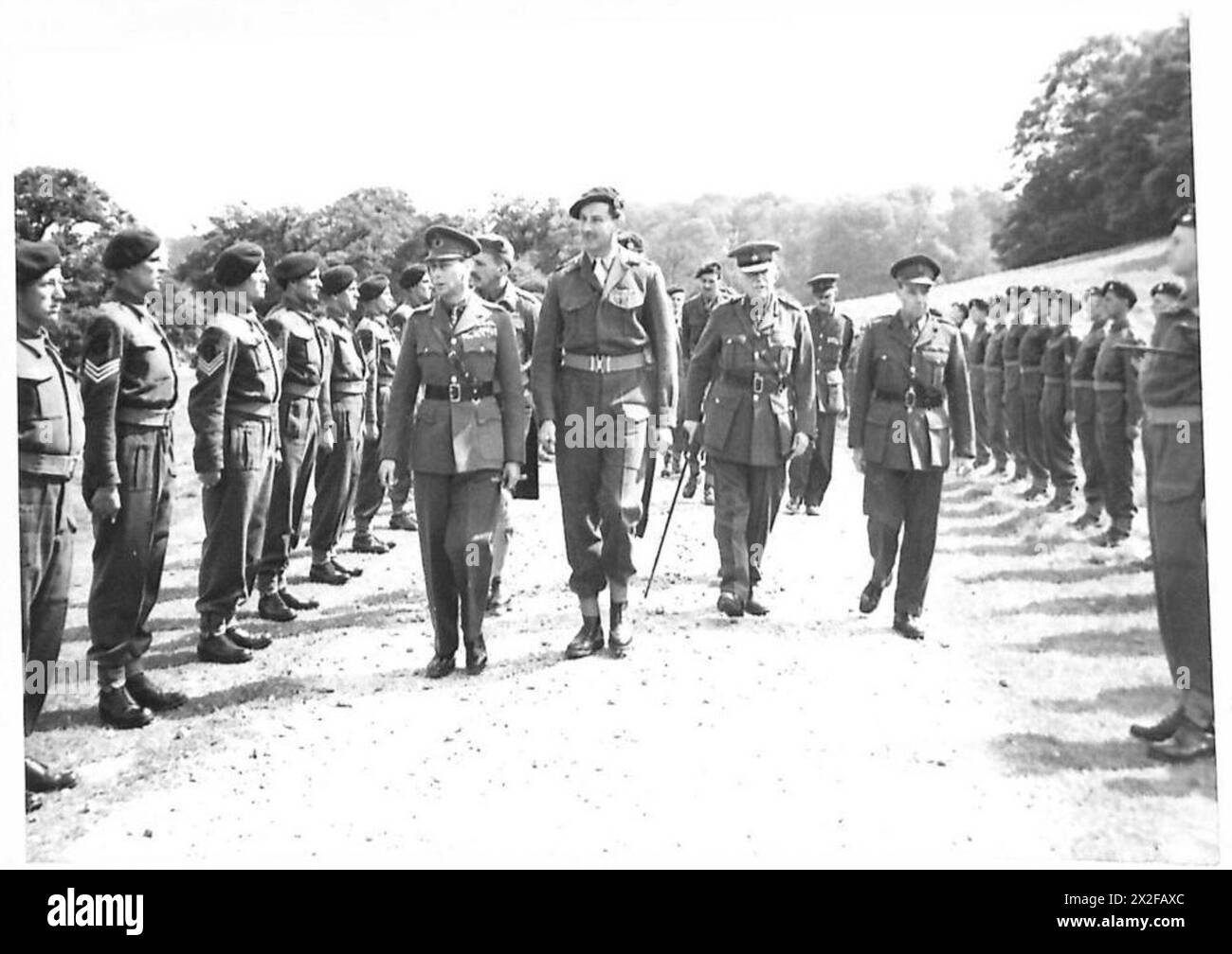 H.M. THE KING INSPECTS INVASION TROOPS - The King accompanied by Lord ...