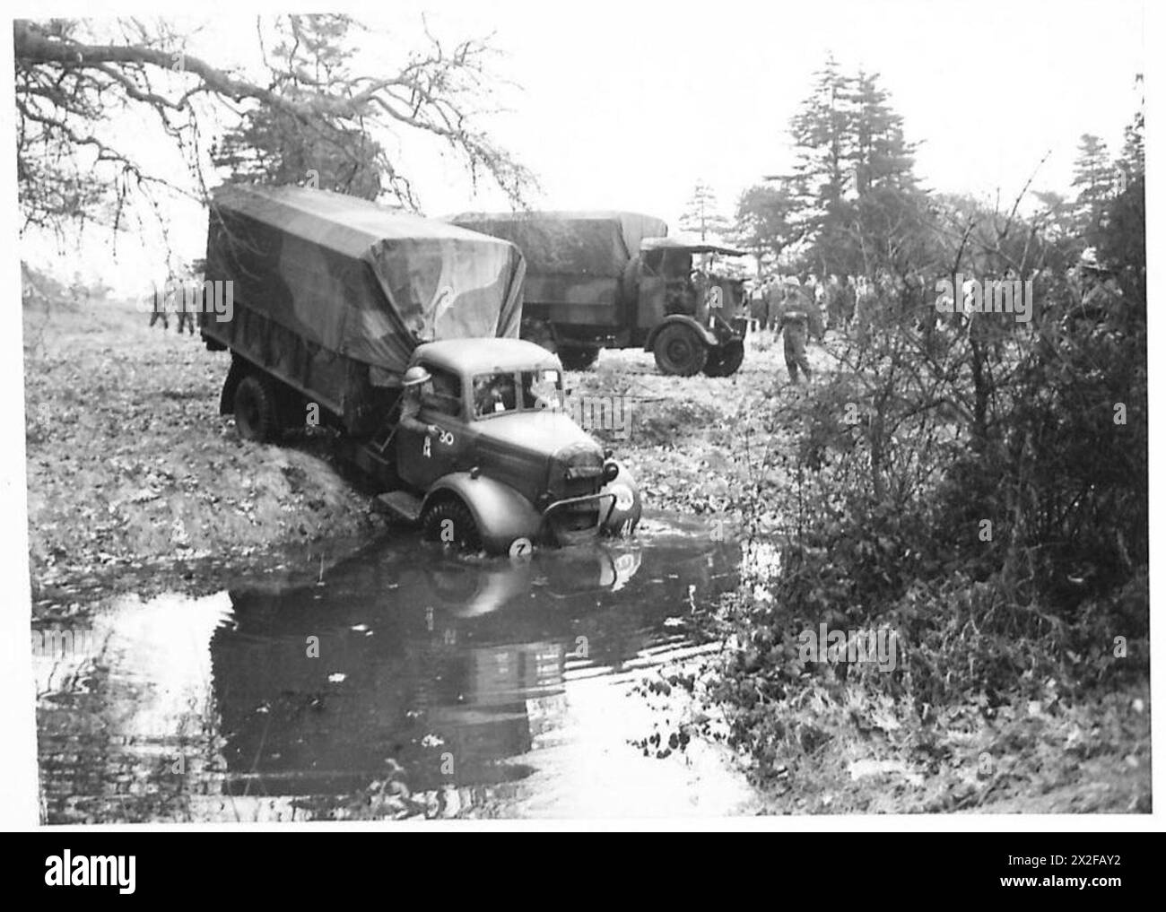 TRAINING ARMY DRIVERS - A ditched lorry being pulled clear British Army ...
