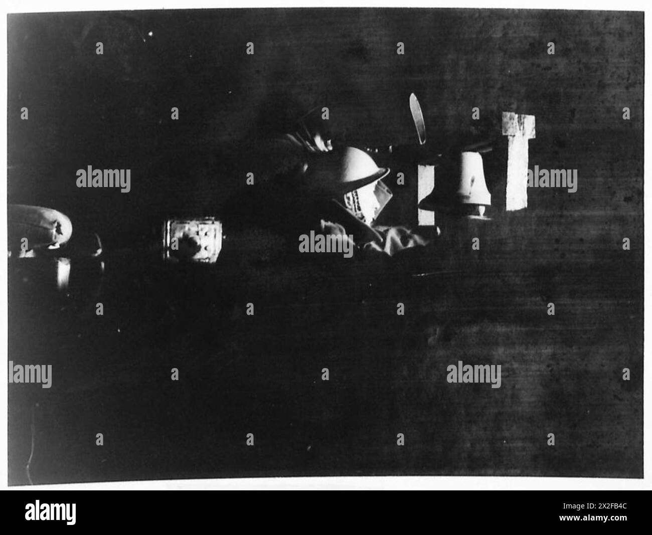 A World War II photograph depicts a 4.5-inch anti-aircraft battery at ...