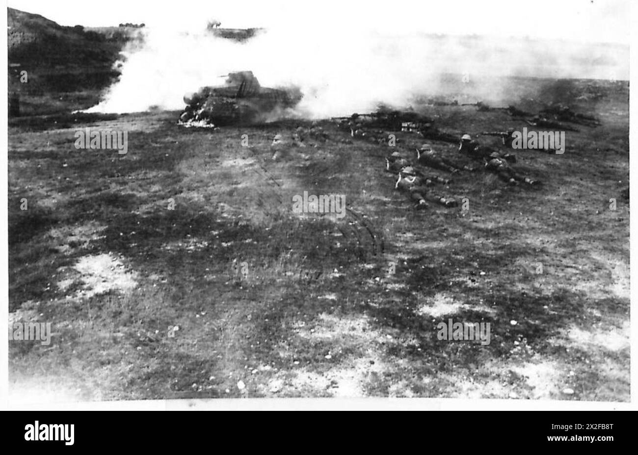 AN ANTI-TANK PLATOON EXERCISE - The platoon having thrown their bombs ...