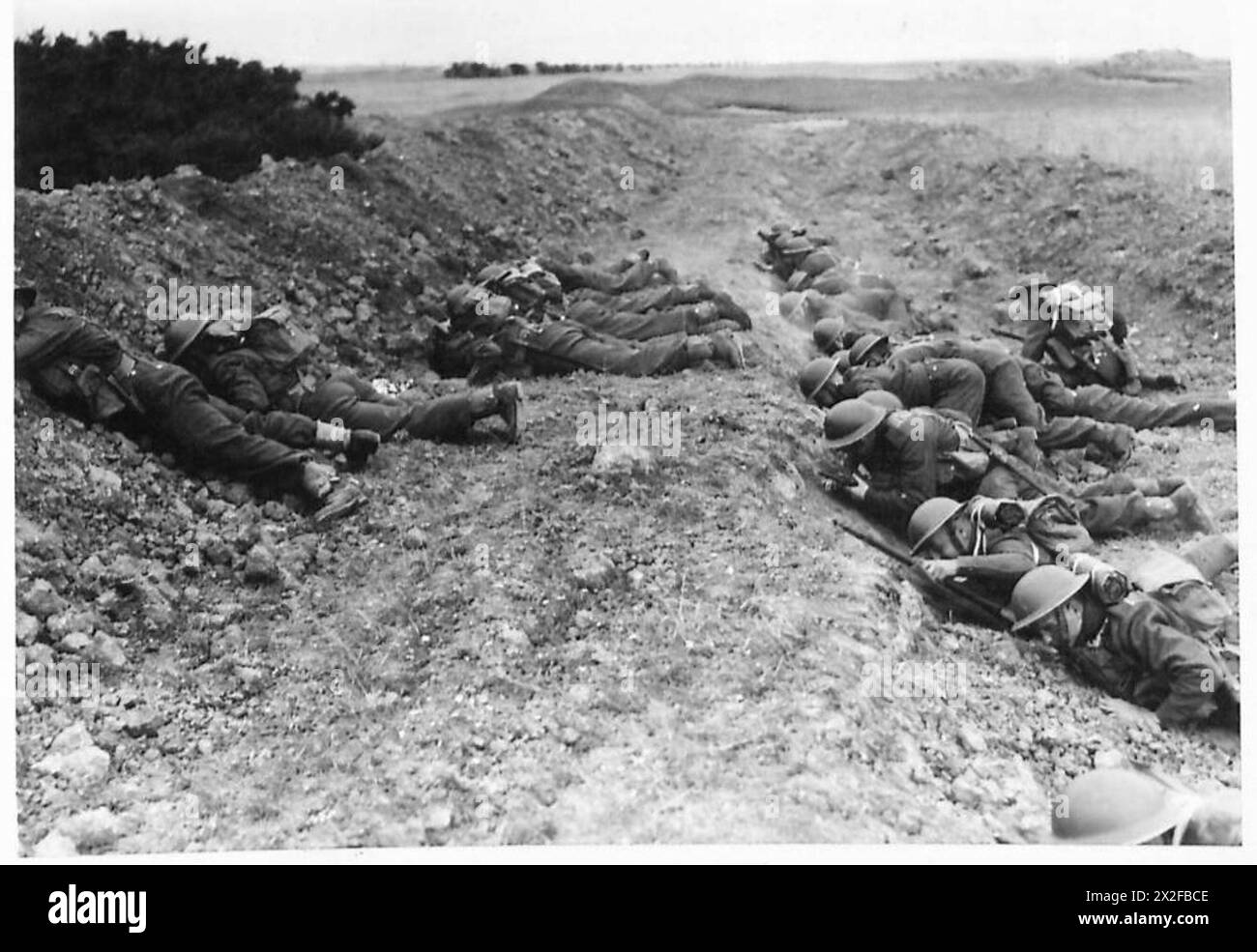 Royal Scots Fusiliers soldiers take cover during live-fire exercises ...
