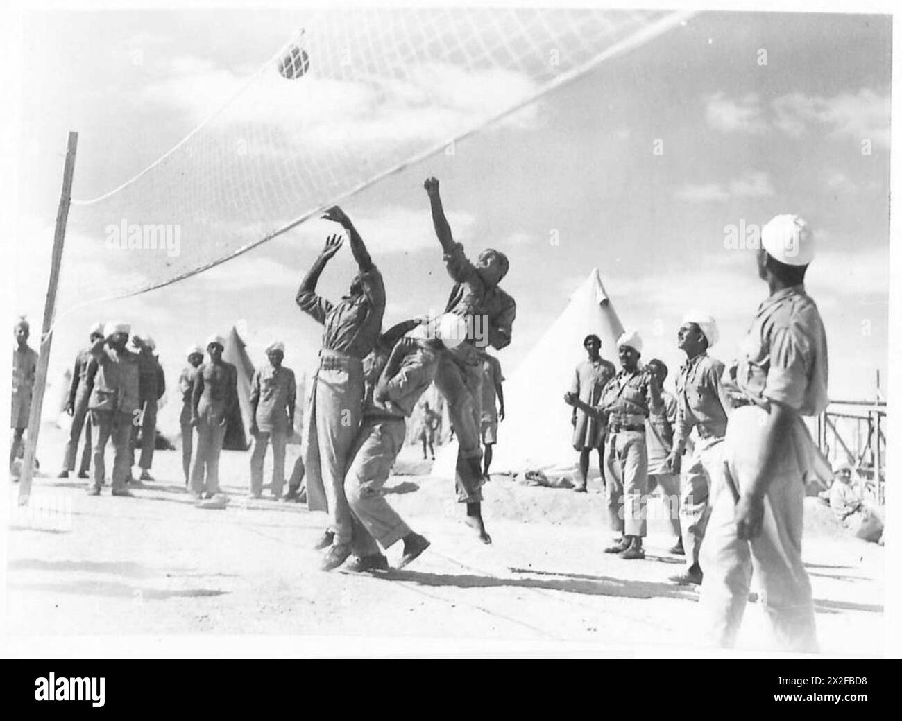 Libyan prisoners of war play handball within the camp, illustrating ...
