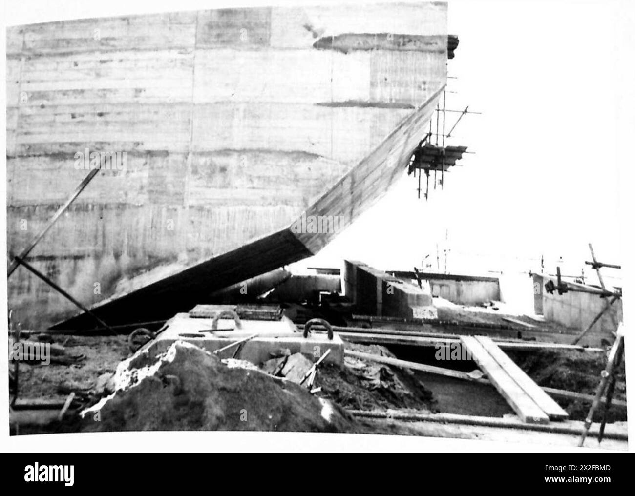 Photographs for Tn. 5 show damage to runners, slipway, and the Hippo ...