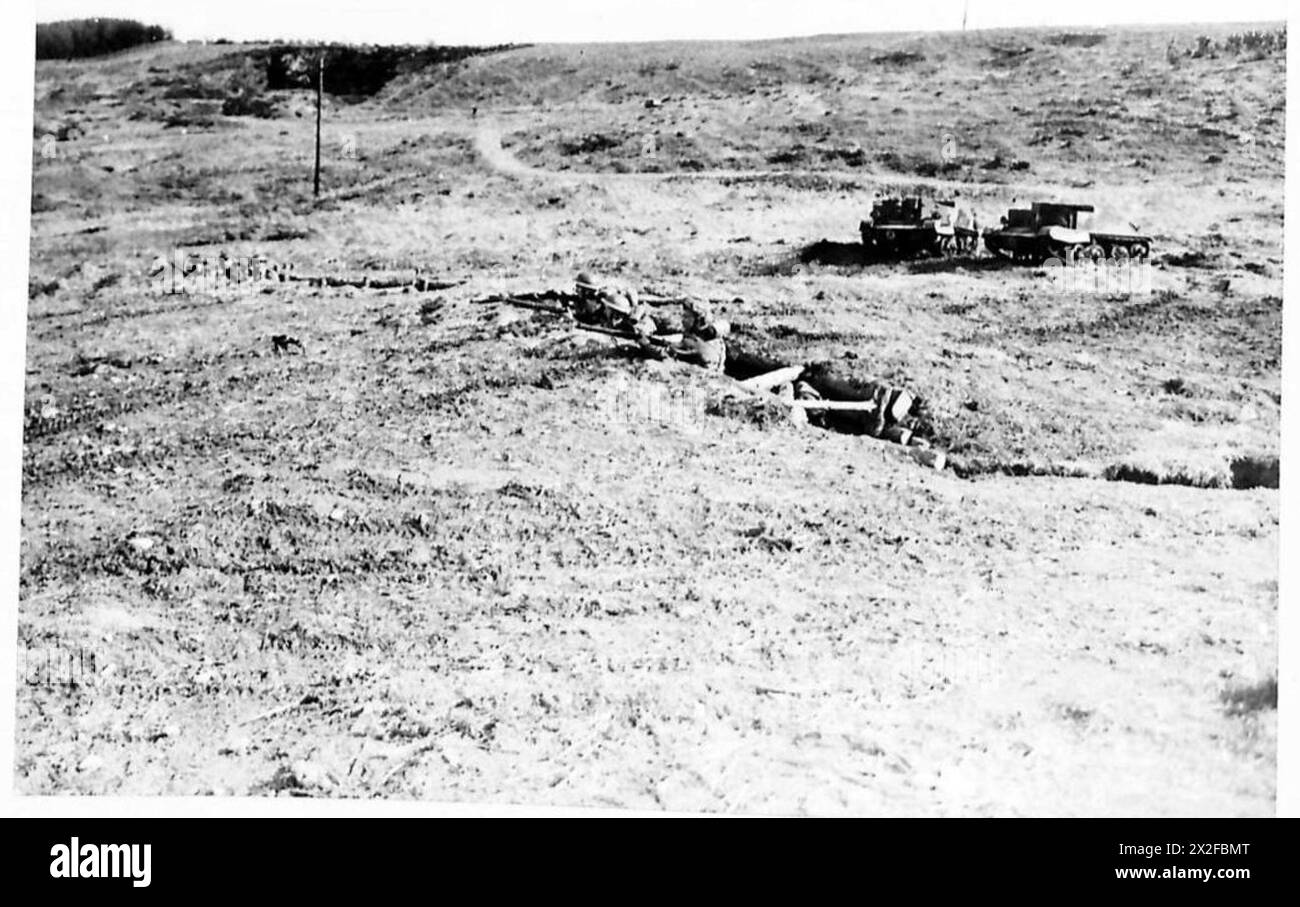 TOUGHENING-UP EXERCISE IN SOUTH WALES - Troops in a trench waiting to ...