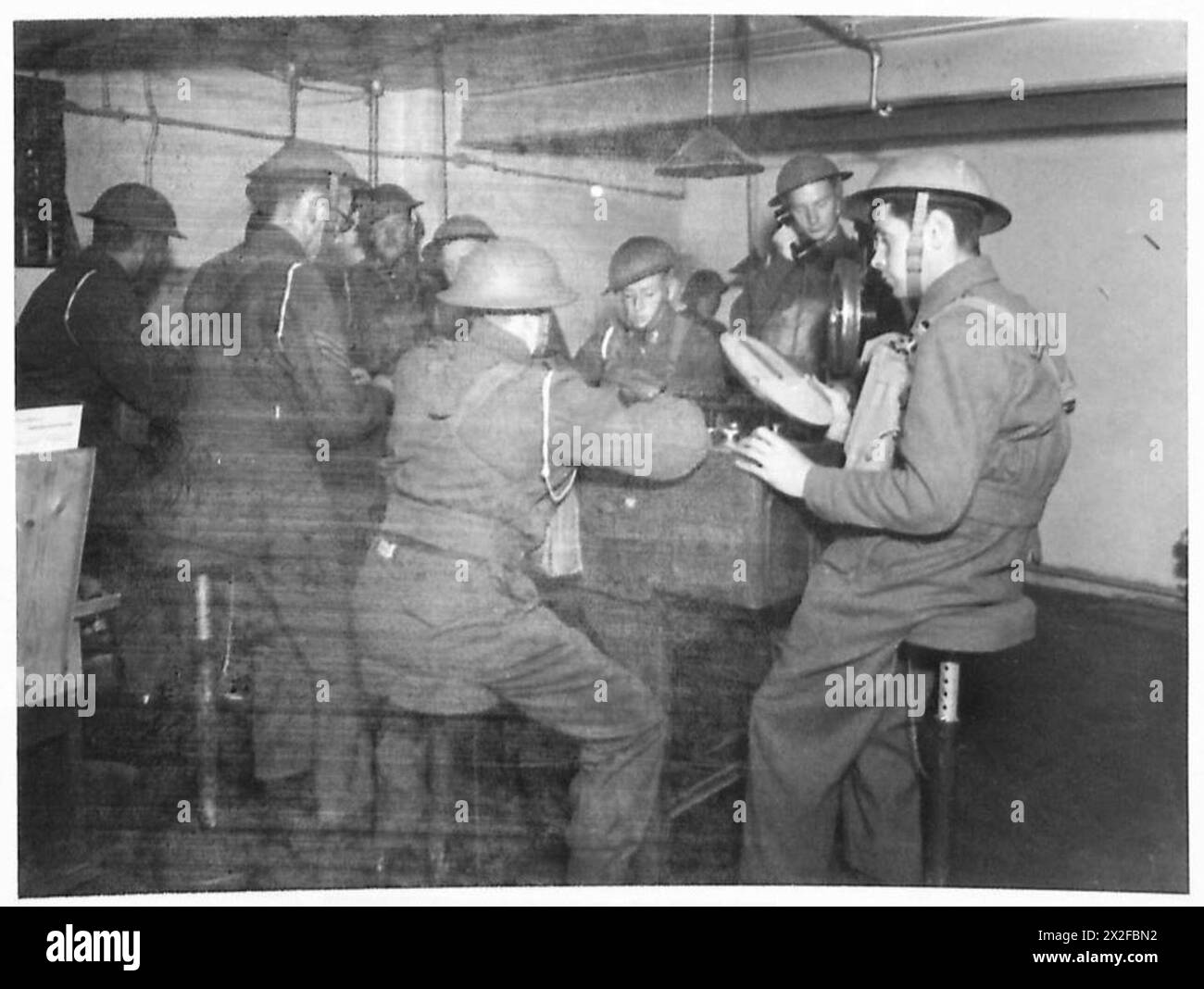 IN A BATTERY OBSERVATION POST - The fire control table producing the ...