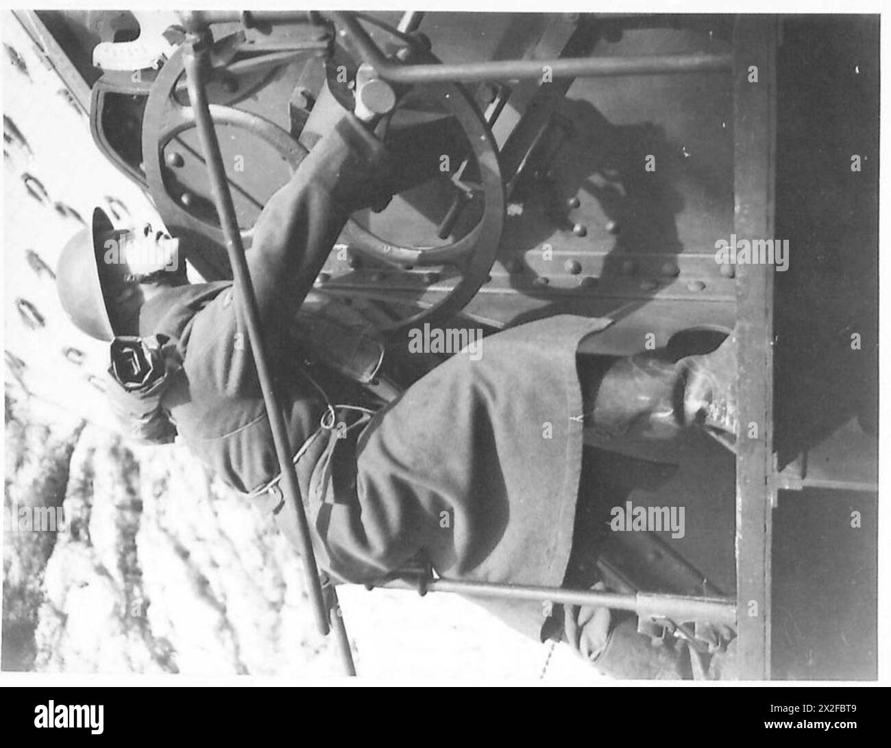 ONE OF BRITAIN'S TEETH - Elevating the gun after loading British Army ...