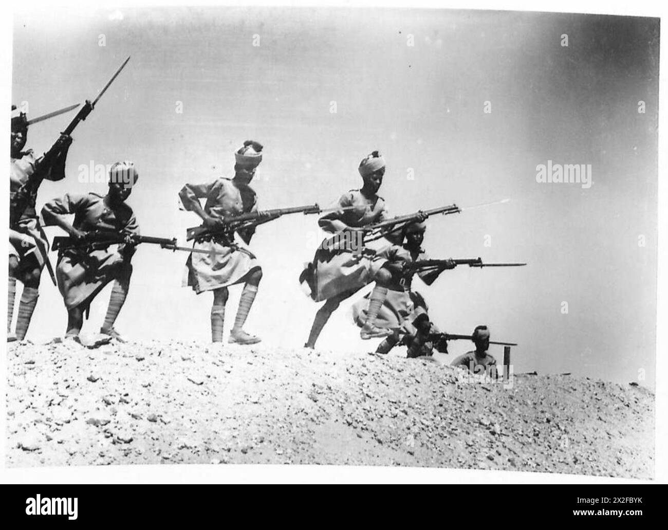 Sudan Defence Force soldiers participate in bayonet practice ...