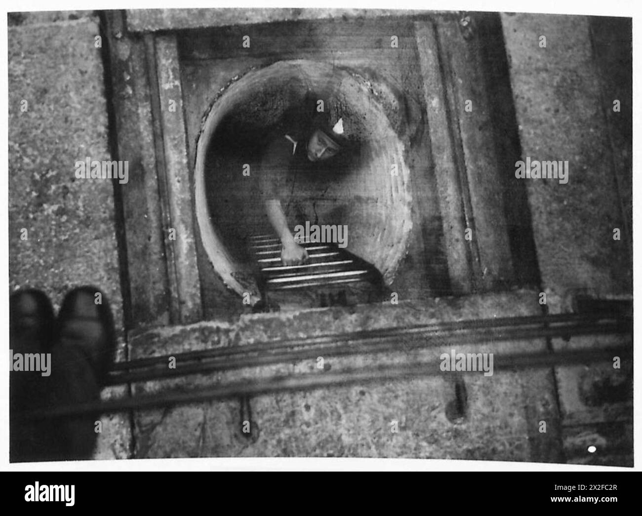 ON A SEA FRONT - One of the men coming up from the interior of the fort ...