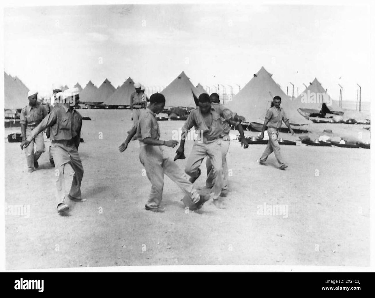 Prisoners of war in a Libyan camp engage in football and other ...
