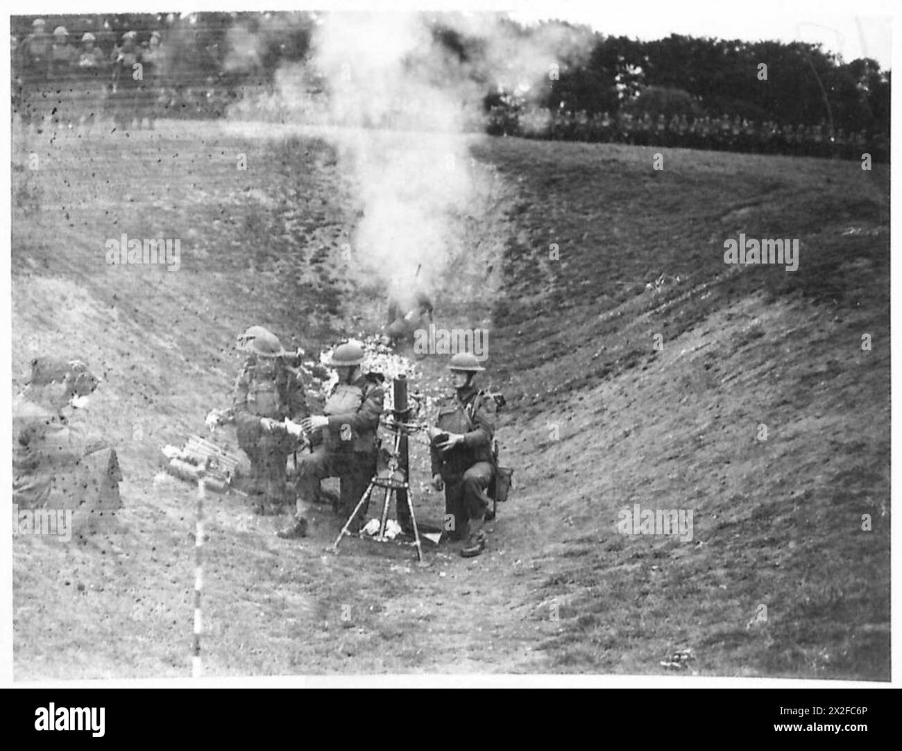 THE GRENADIER GUARDS IN TRAINING - The three inch Mortar has just been ...