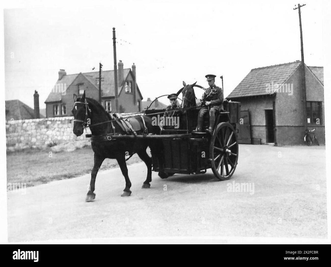 R.A.V.C. 1st Corps troops transport a patient using a horse float ...