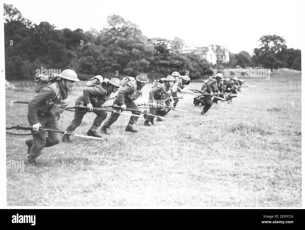 NORWEGIAN TROOPS IN TRAINING - Infantrymen advance during a "change" to ...