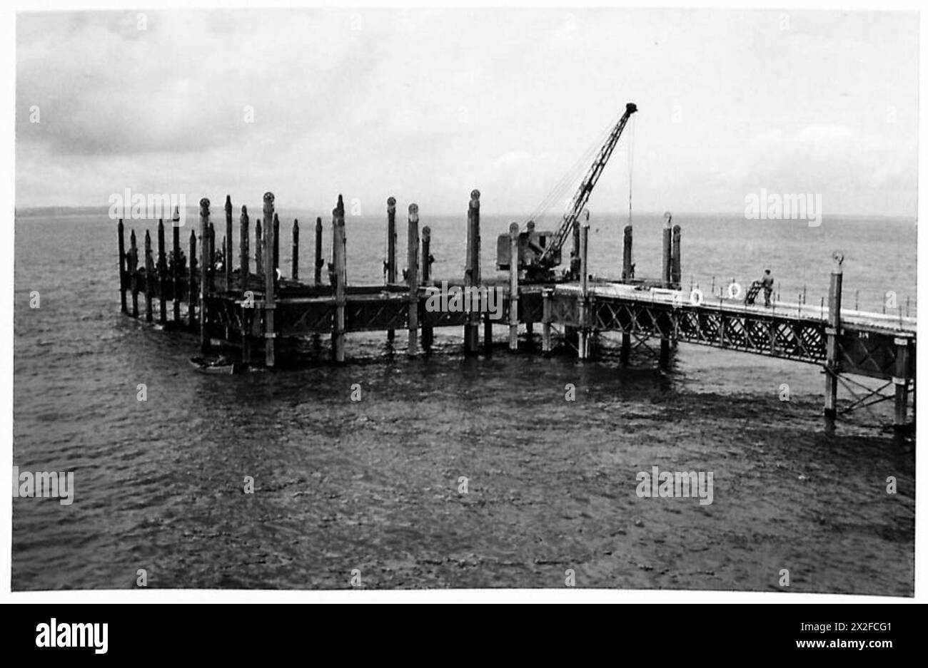 Photographs depict a British Army composite pier at Gosport during a ...