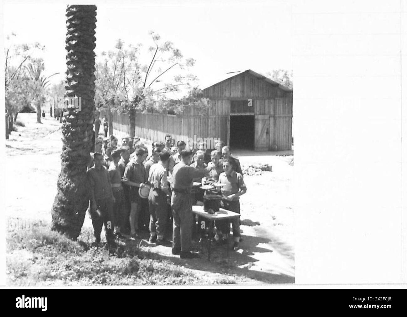 A British coastal battery in Lebanon lines up personnel for lunch ...