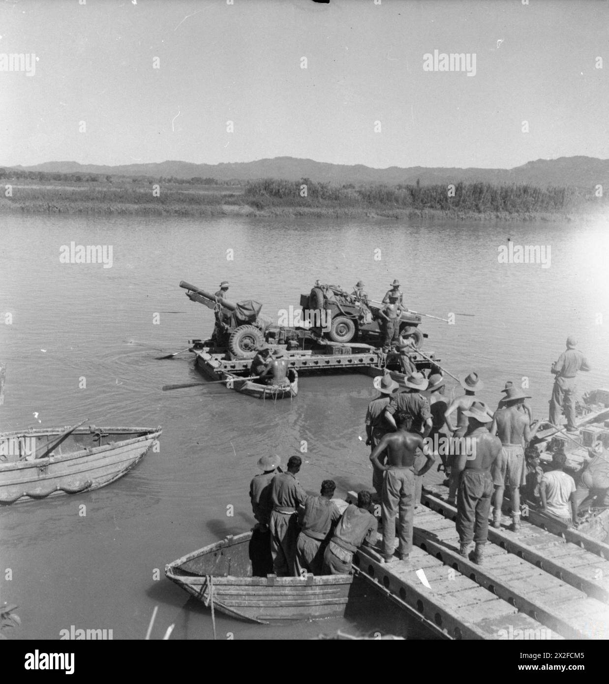 THE BRITISH ARMY IN BURMA 1945 - A 25-pdr field gun and jeep being ...