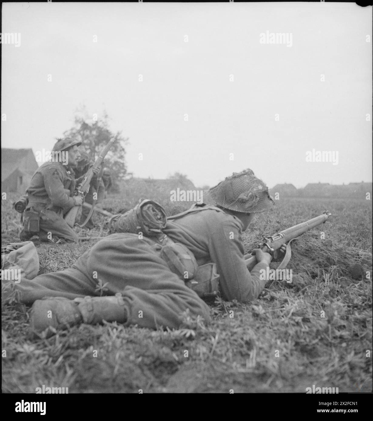 Infantry in the front line conduct the assault on Venraij on 17 October ...