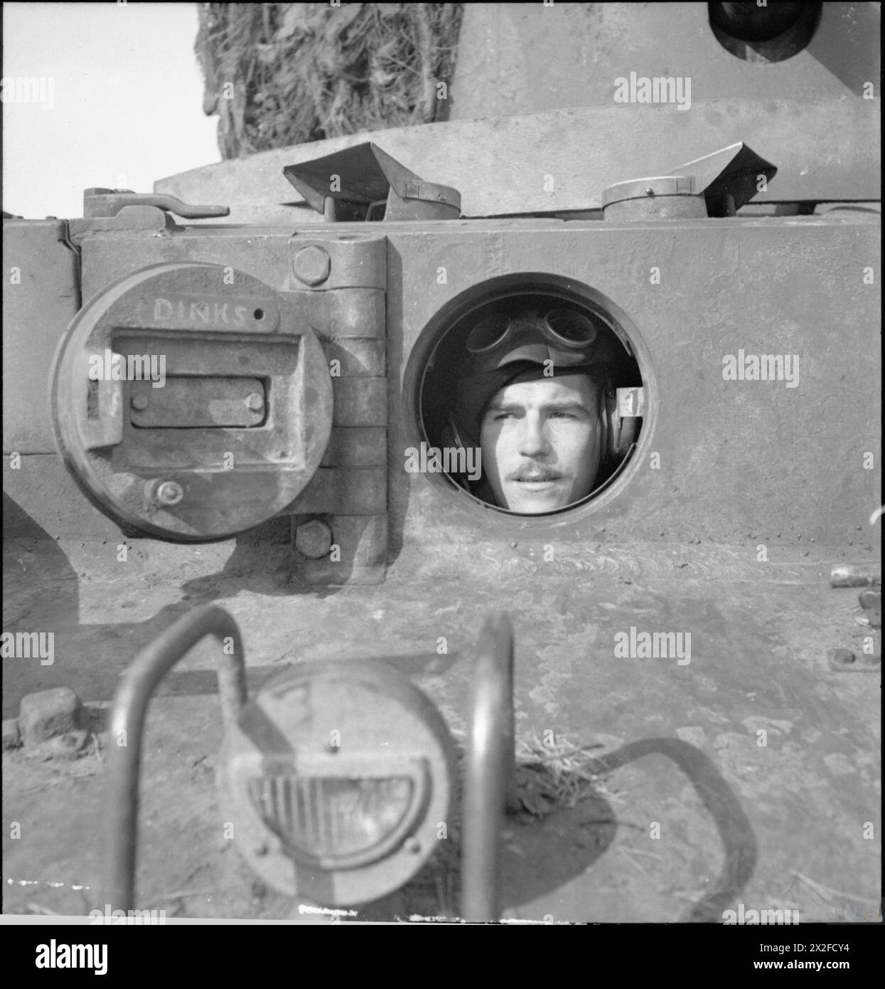 Trooper S. Coombes of Cardiff drives a Challenger tank of 15/19th ...