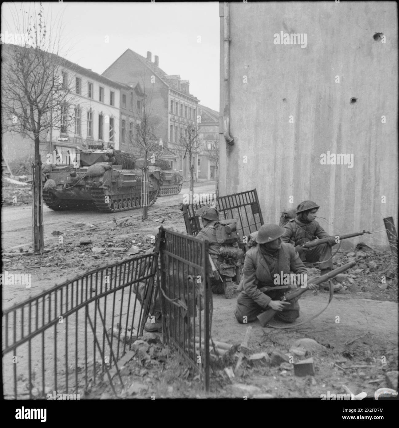 Churchill tanks of the 6th Guards Tank Brigade advance with infantry of ...