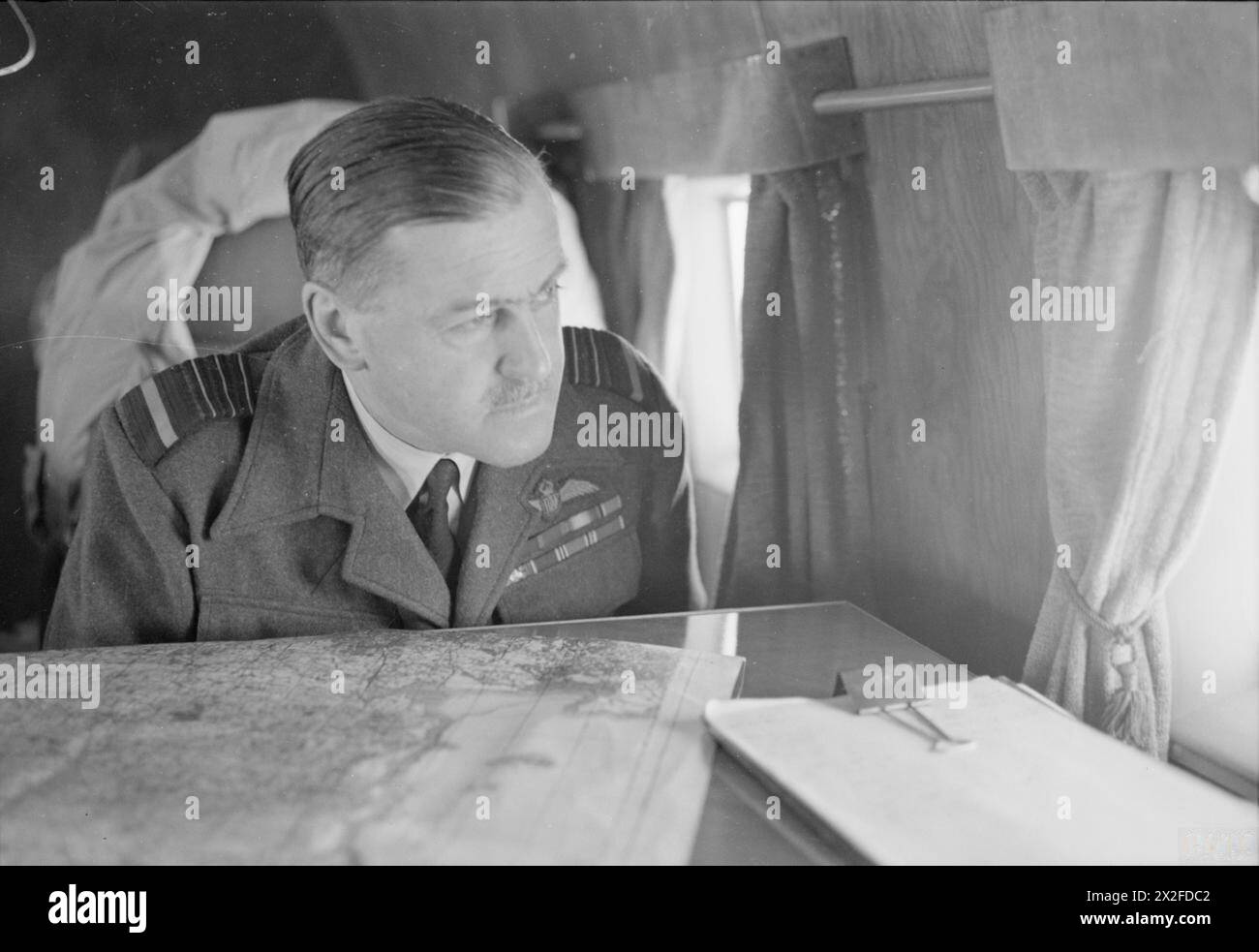 Air Chief Marshal Sir Trafford Leigh-Mallory observes Normandy from a ...