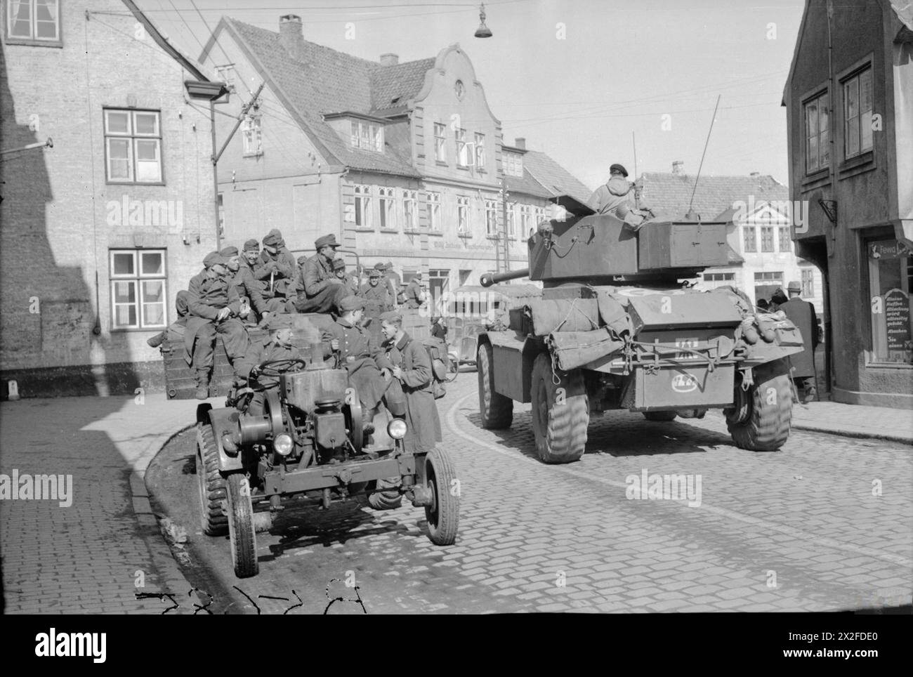 THE BRITISH ARMY IN NORTH-WEST EUROPE 1944-45 - An AEC armoured car of ...