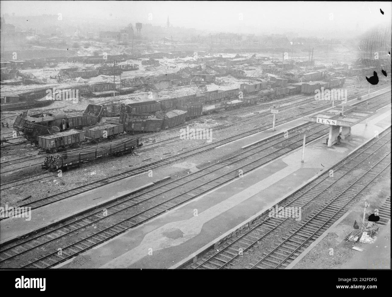 Wrecked marshalling yards and the passenger station at Lens, France ...