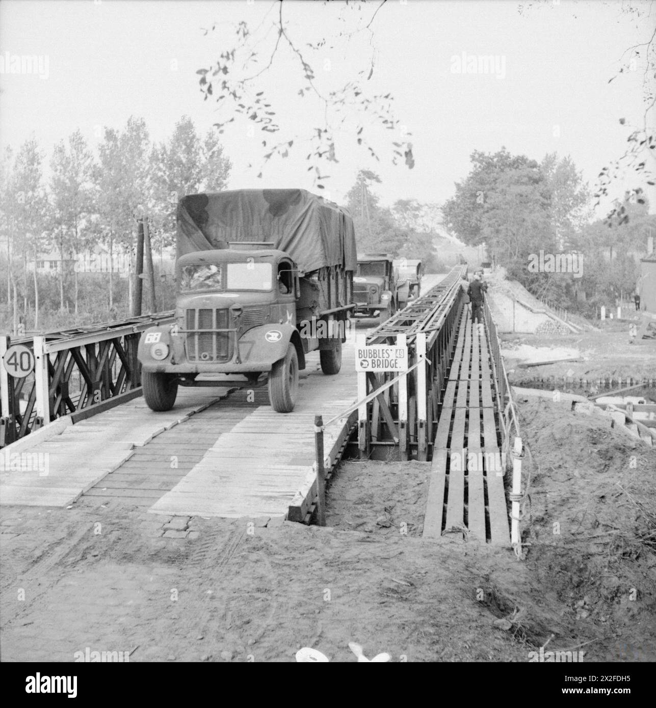 THE BRITISH ARMY IN NORTH-WEST EUROPE 1944-1945 - 49th Division lorries ...