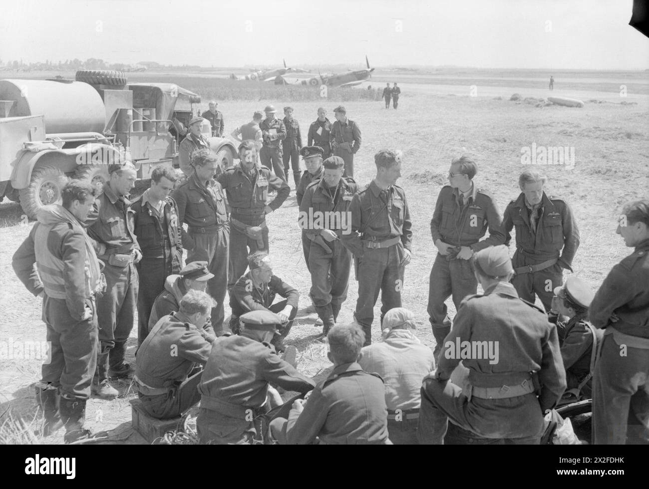 Hawker Typhoon pilots of Nos. 121 and 124 Wings discuss operations at ...