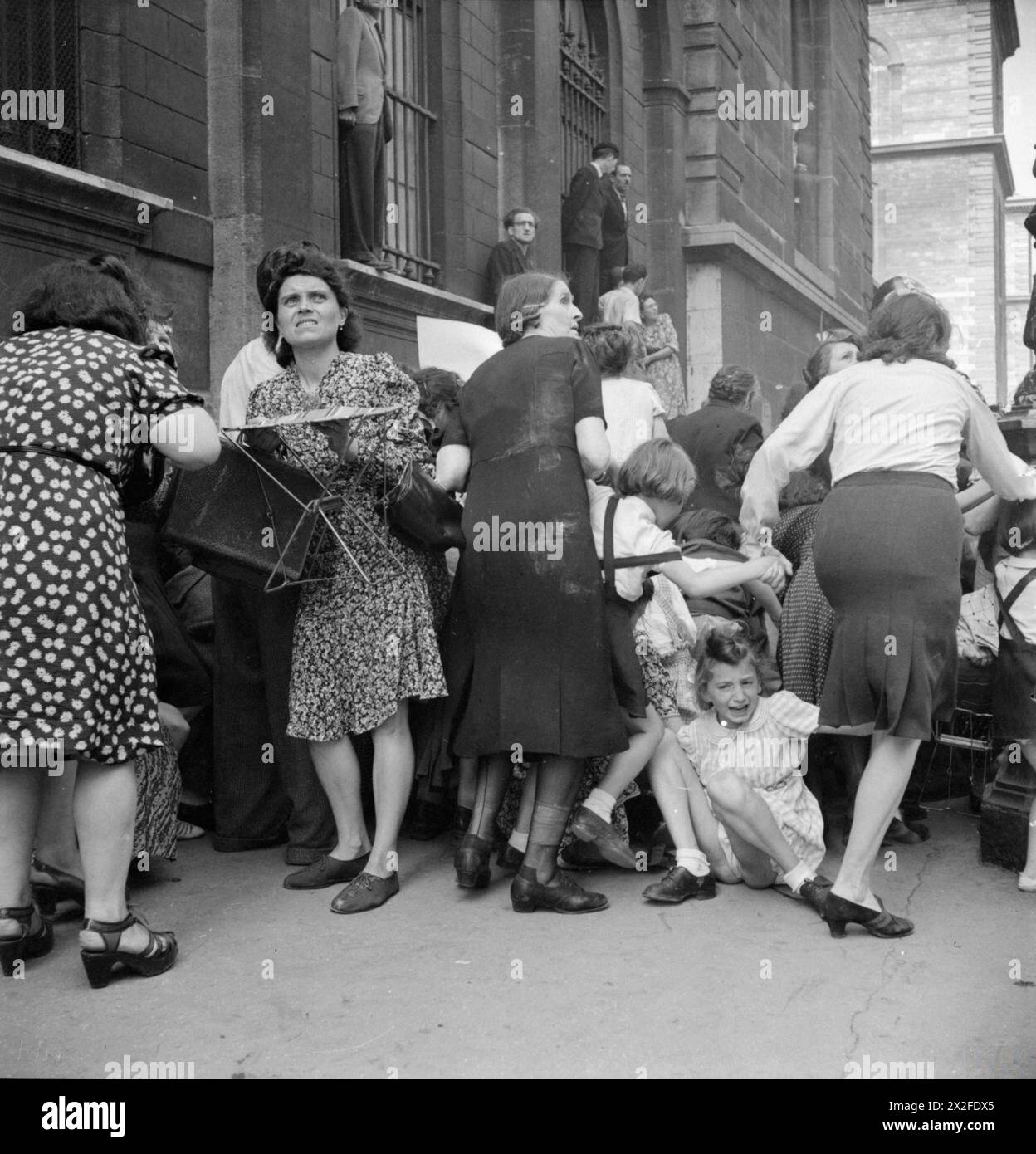 THE LIBERATION OF PARIS, AUGUST 1944 - French civilians run for cover ...