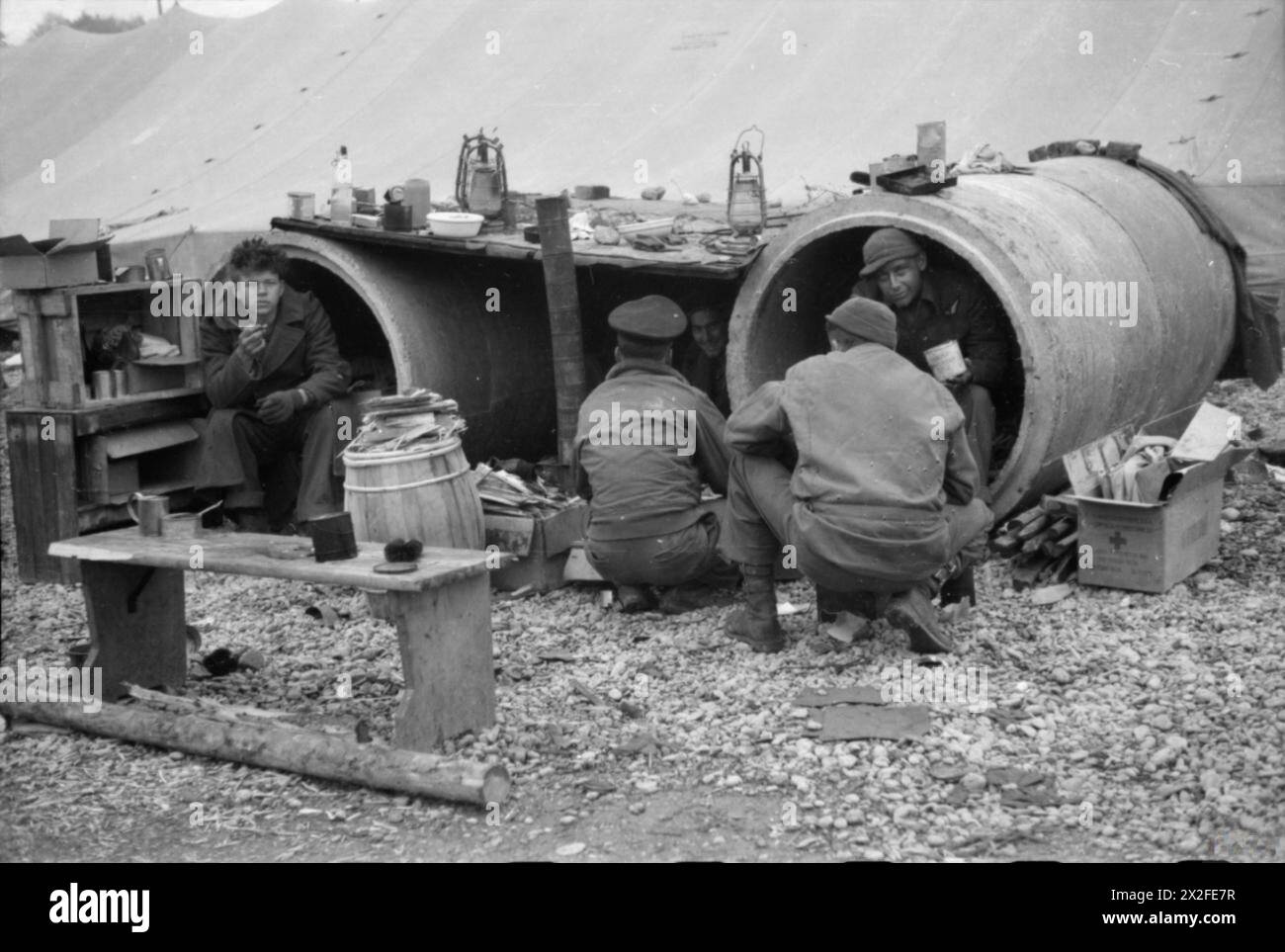 Former prisoners of war shelter in makeshift structures made from ...