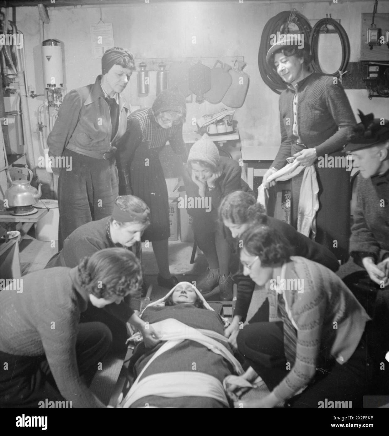 Women in East Dean, Sussex, practice First Aid skills at a village hall ...