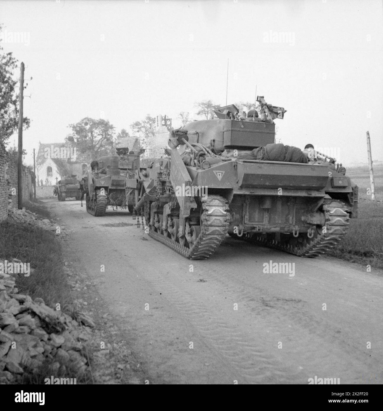 THE BRITISH ARMY IN NORMANDY 1944 - Sherman Crab flail tanks enter ...