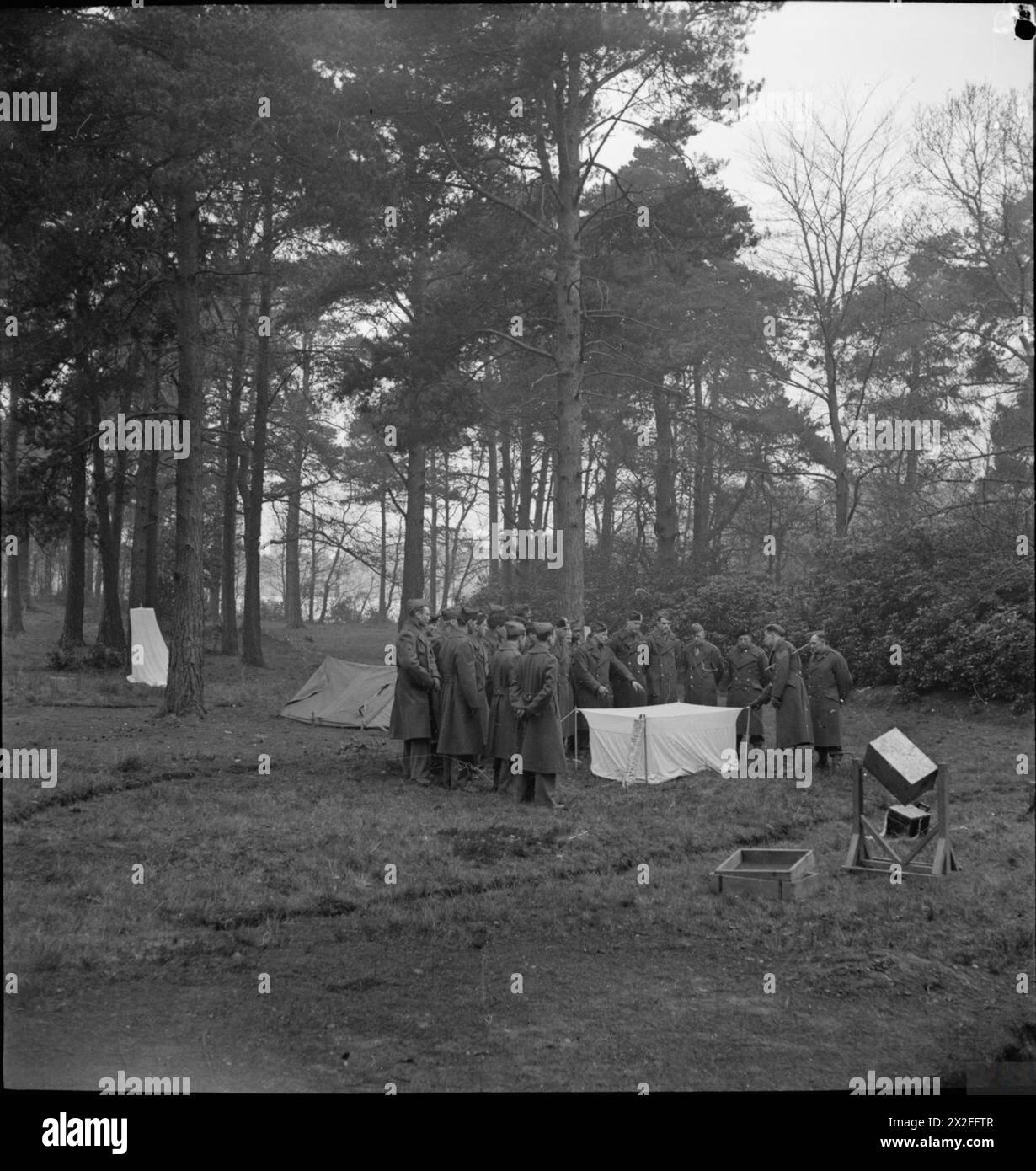 British and American troops attend a lecture and demonstration on the ...