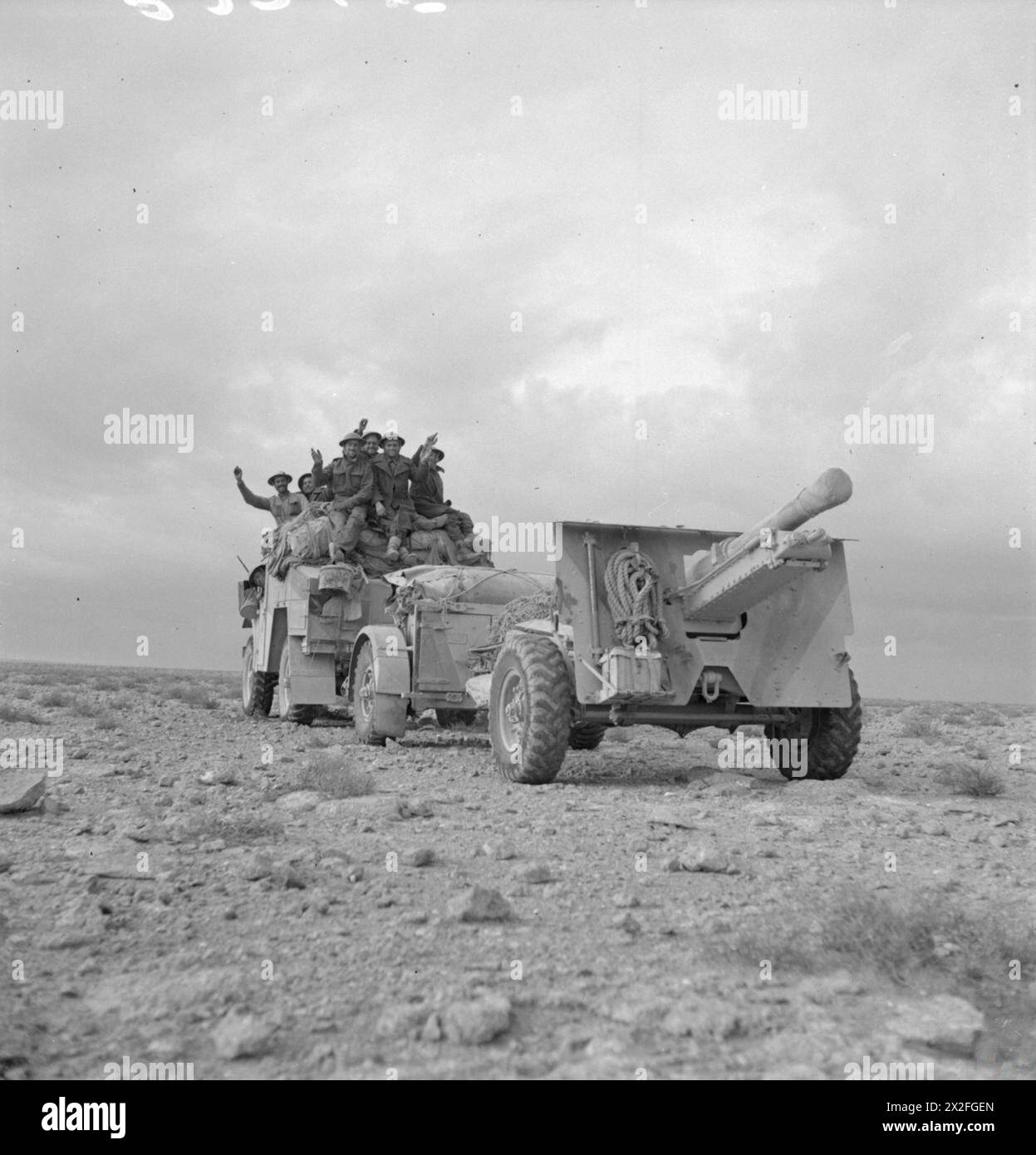 A 25-pounder field gun and 'Quad' artillery tractor of the British Army ...