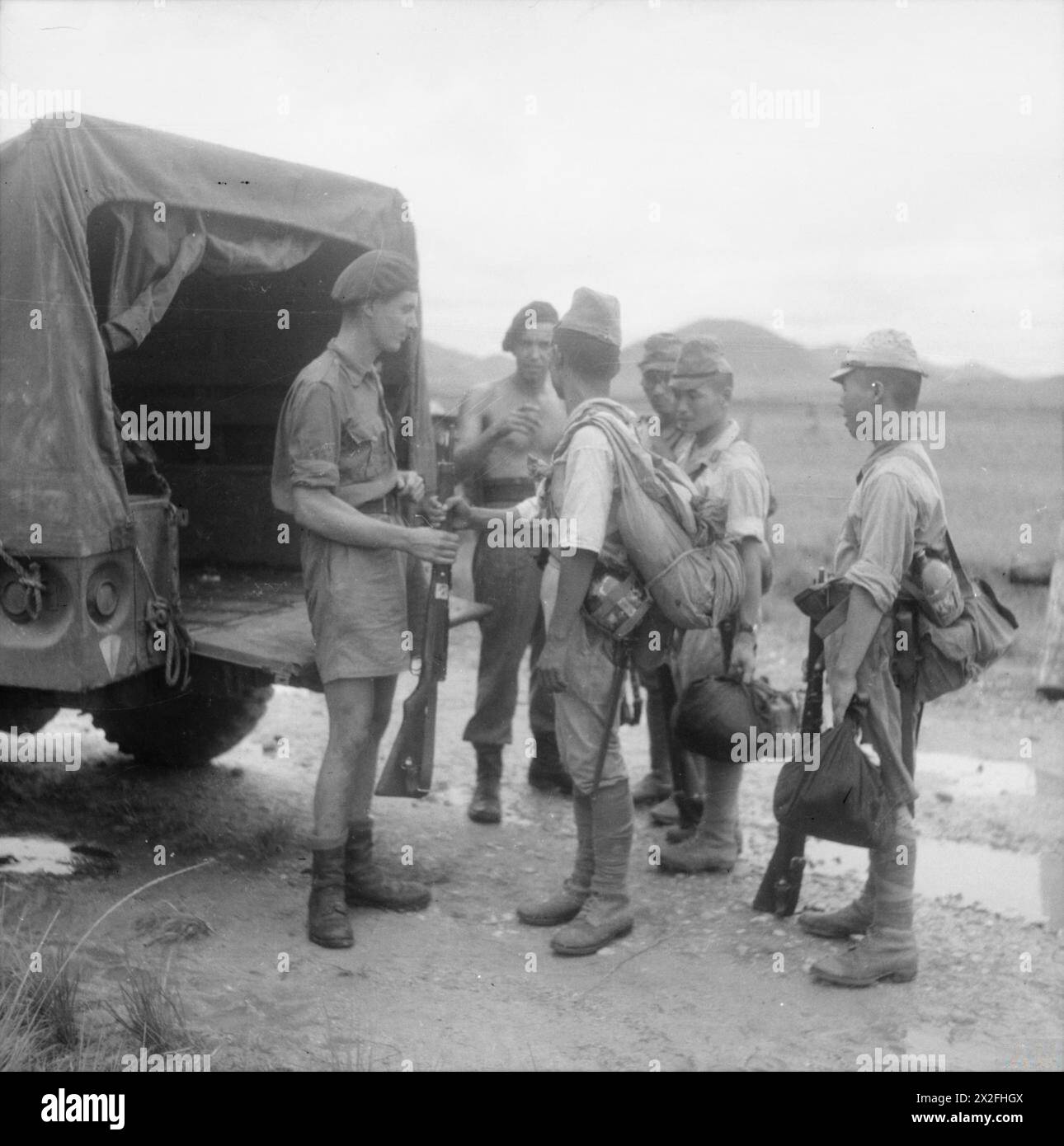 THE BRITISH REOCCUPATION OF HONG KONG, 1945 - Four Japanese soldiers ...