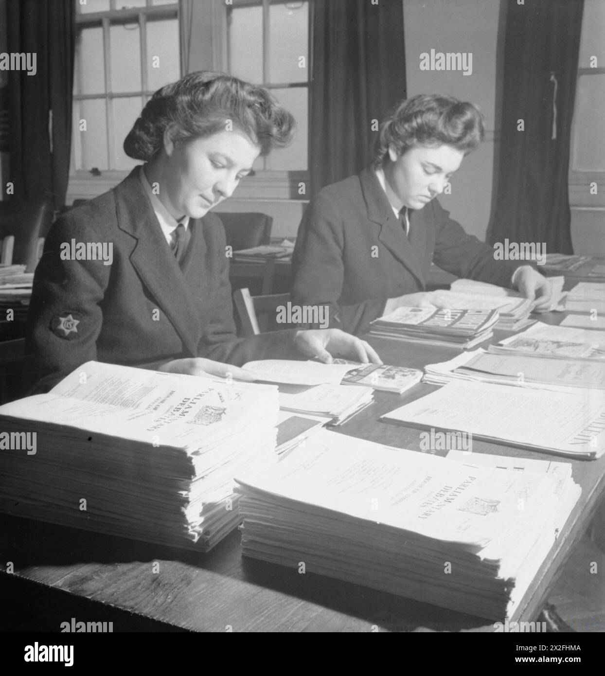 WRENS PREPARE FOR CIVILIAN LIFE - Two WRENs study information leaflets ...
