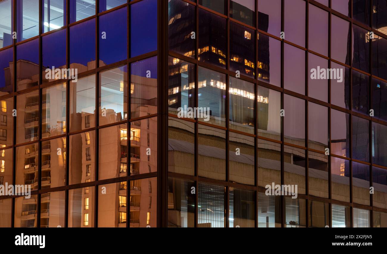 Vancouver skyscraper reflections during blue hour before night, British ...
